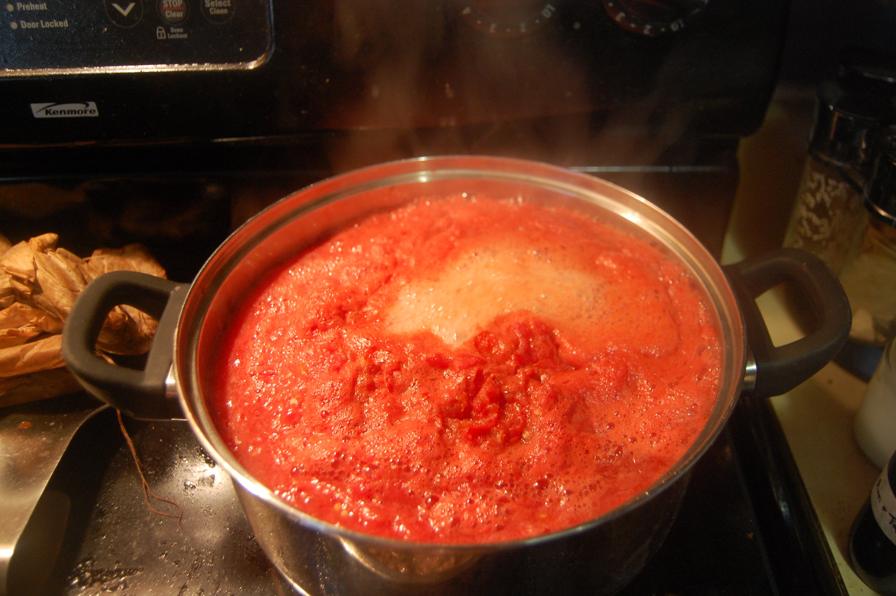tomatoes boiling, foaming
